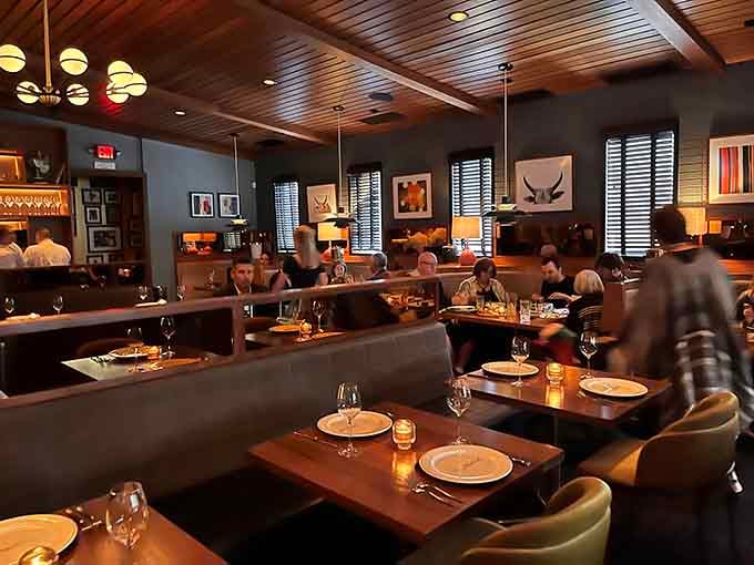 Cozy booths and warm lighting create an atmosphere where every meal feels like a special occasion worth celebrating.