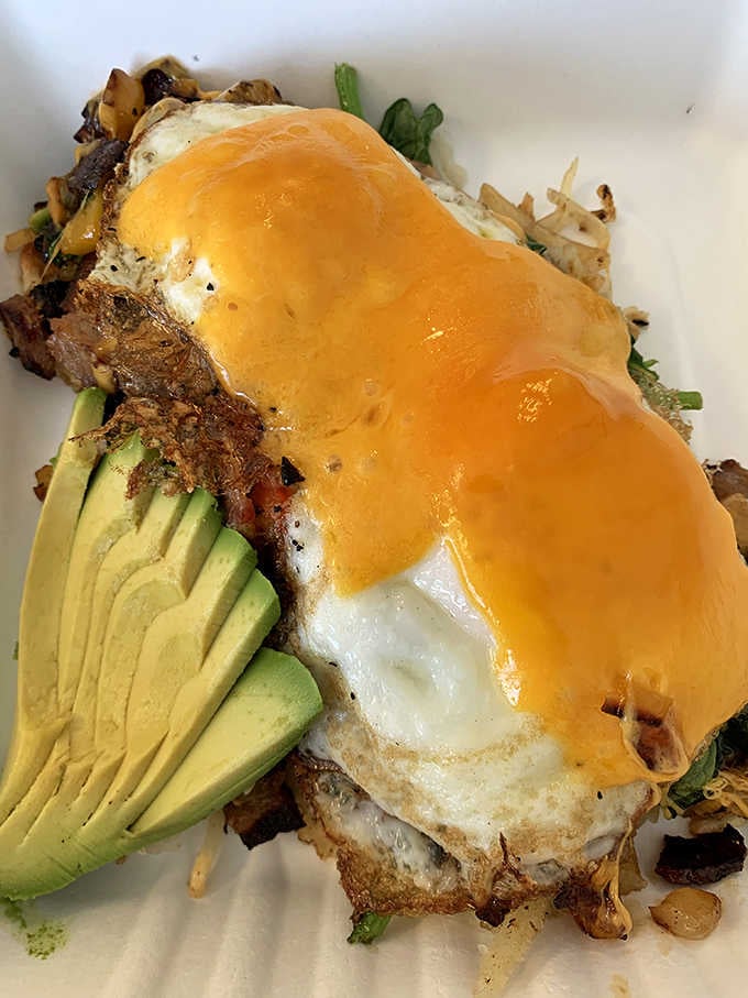 This breakfast bowl loaded with eggs, avocado, and hollandaise is basically happiness served in convenient, delicious bowl form.