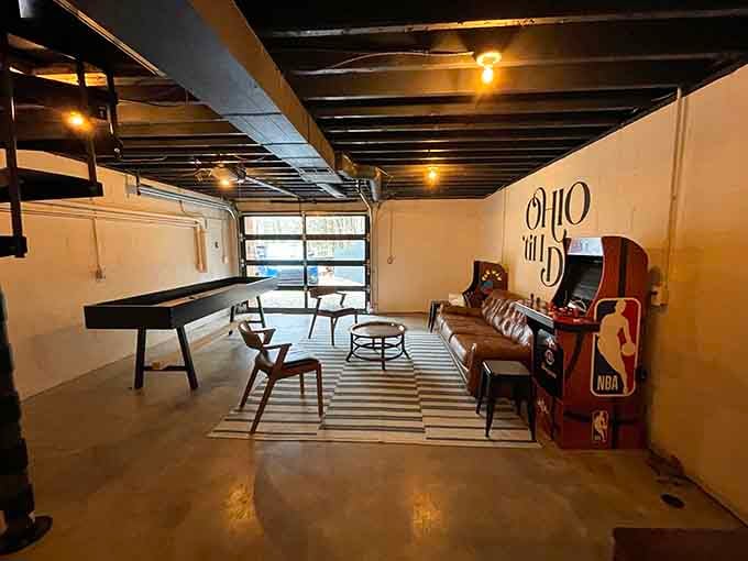 A game room complete with vintage arcade vibes, because sometimes you need a break from all that nature relaxation.