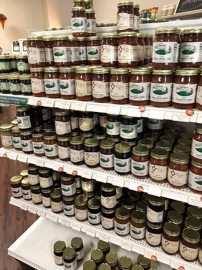 Homemade preserves stacked like edible treasure remind you that some things are still made with actual love and care.