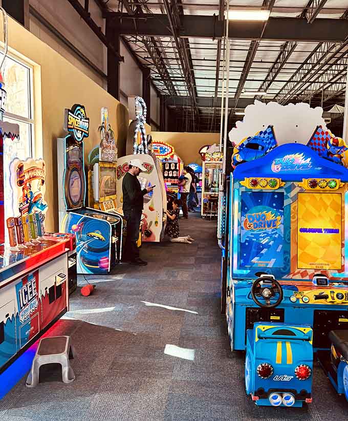 The arcade stretches out like a neon wonderland where tickets equal currency and everyone's suddenly an economist.