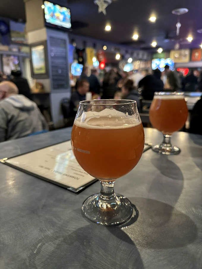 A cold craft beer in a proper glass, because even neighborhood bars know how to treat their beverages right.
