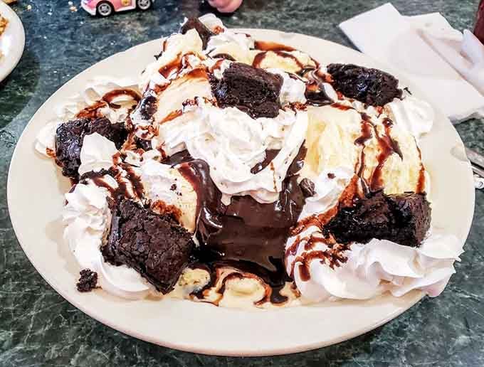 This brownie sundae looks like it was designed by someone who thinks "moderation" is just a town in California somewhere.