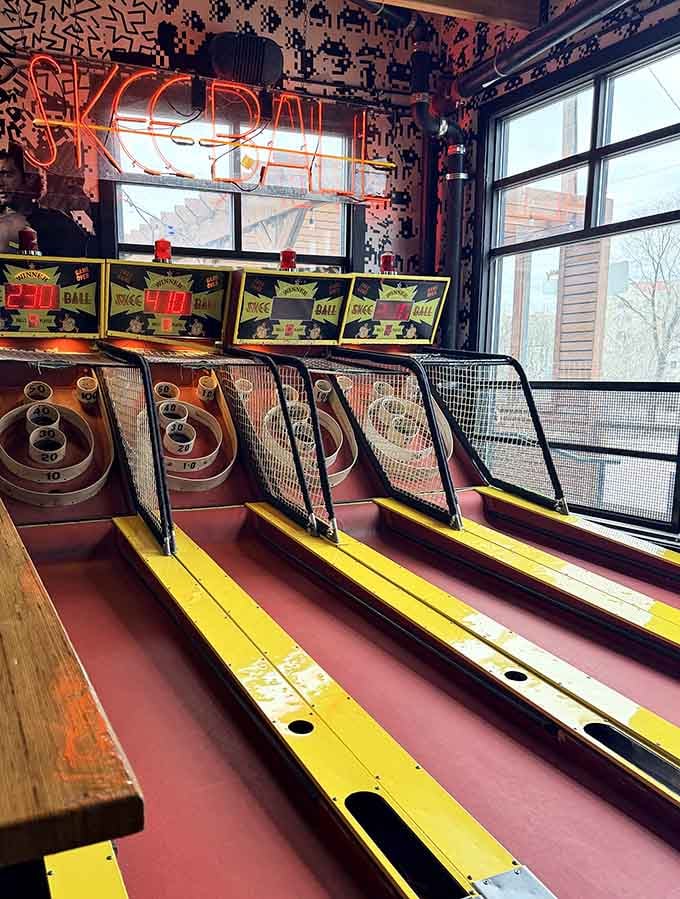 Skee-ball lanes bathed in neon light, where dreams of hitting that elusive 100-point hole never die.