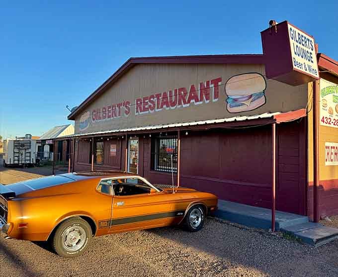 That vintage muscle car parked outside tells you everything about this place's character and timeless desert appeal.