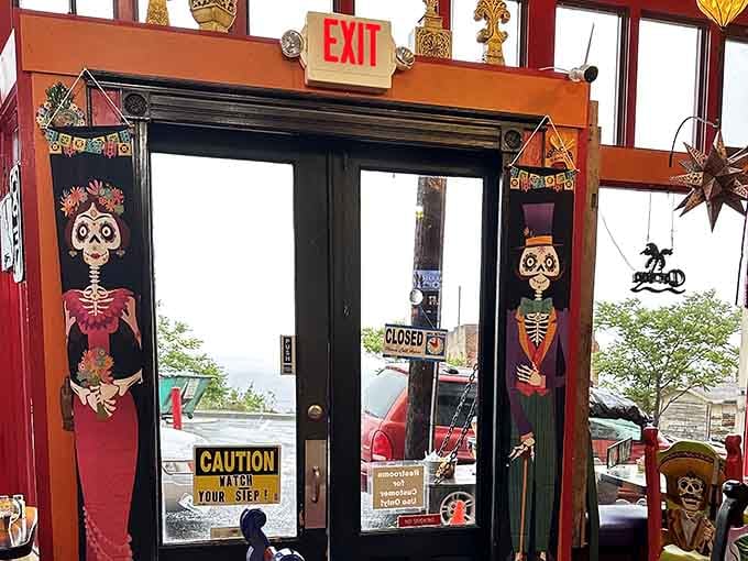 Even the exit is decorated with Day of the Dead art, because why should leaving be boring?