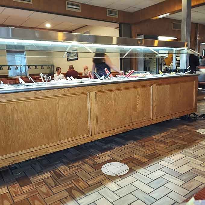 The buffet-style setup lets you customize your meal while keeping everything fresh and accessible throughout service hours.