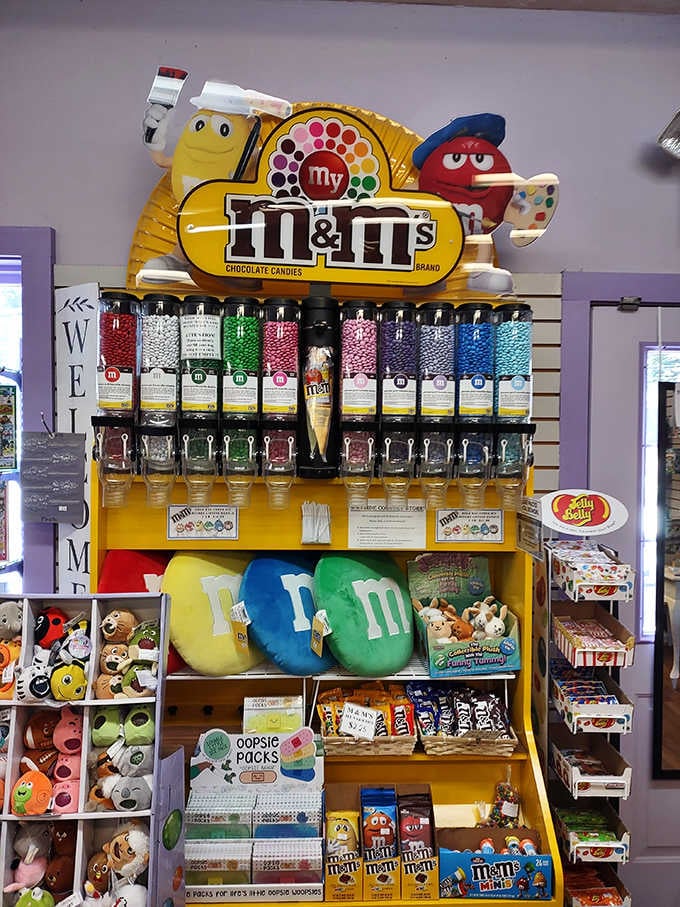 An M&M's dispenser that's basically a candy lover's dream come true in bright, cheerful yellow glory.