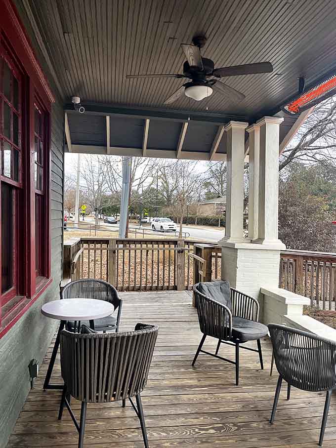 The front porch offers fresh air and people-watching opportunities when you need a break from fictional drama.