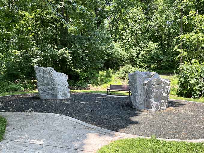 Stone pillars framing a peaceful bench, the kind of spot where life's big decisions get made quietly.