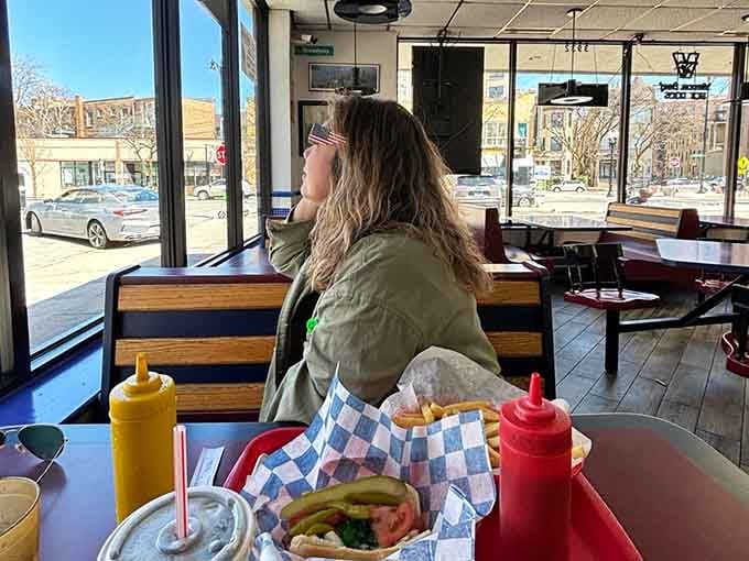 Window seats are perfect for people-watching while working your way through a gyro plate that defies portion control logic.