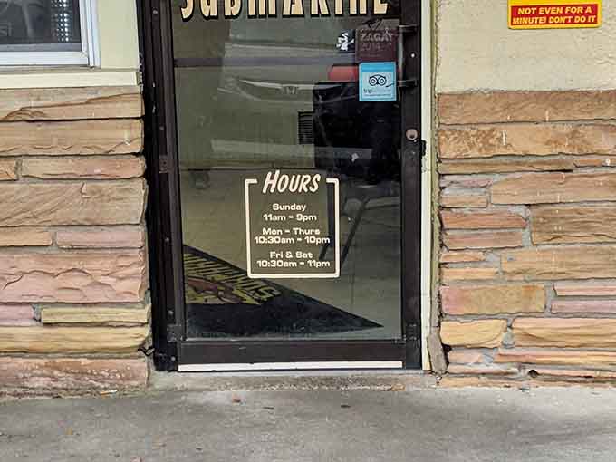 Business hours posted clearly, because transparency is refreshing in a world of "check our Instagram for today's hours maybe."