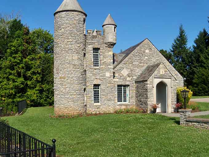 The castle's limestone towers and arched entrance look straight out of medieval Europe, right here in Kentucky.