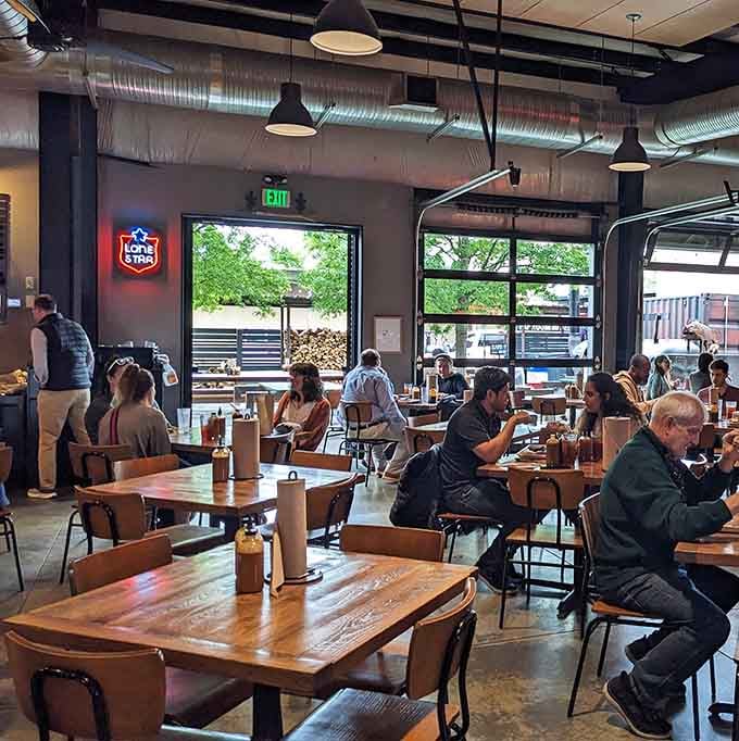 The diverse crowd enjoying their meals together shows how exceptional food brings everyone to the same table.