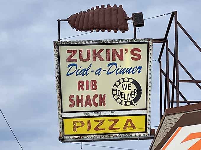 A sign featuring a giant rib and the words "We Deliver"&mdash;because sometimes you need excellence brought directly to you.