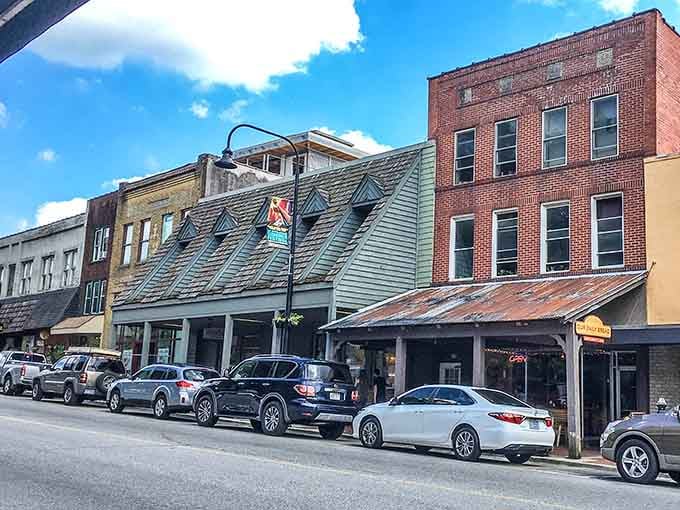 Downtown buildings huddle together under mountain skies, creating cozy spaces for coffee and conversation year-round.