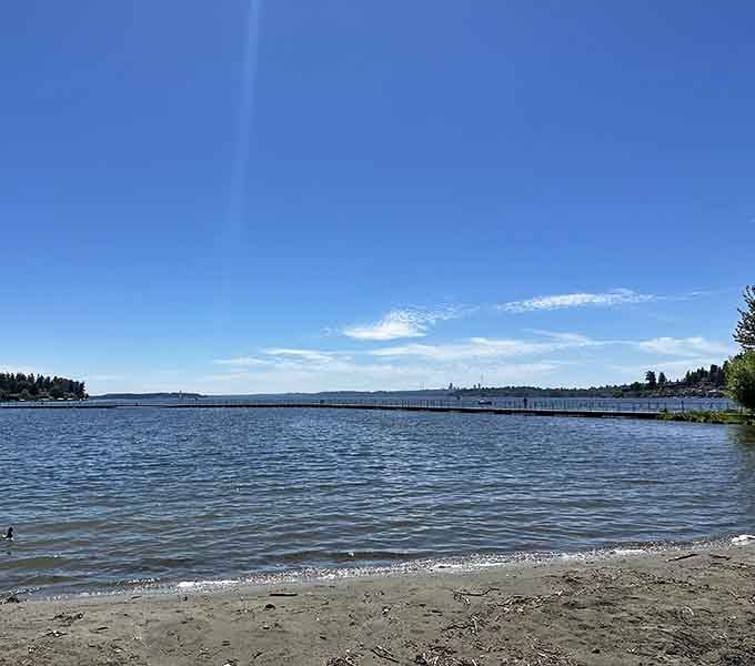 That long pier stretching into calm blue water practically begs you to stroll out and contemplate life's big questions.