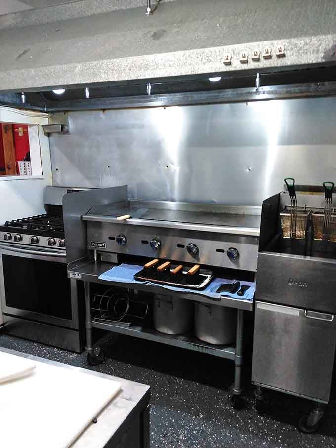 That gleaming professional griddle and spotless kitchen equipment show the serious commitment to quality happening behind every delicious plate.