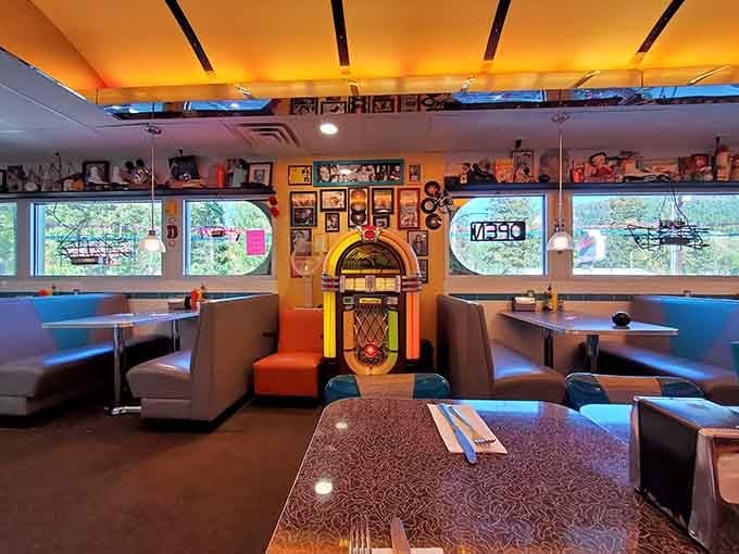 That glowing jukebox surrounded by cozy booths sets the scene for meals that taste even better with a soundtrack playing.