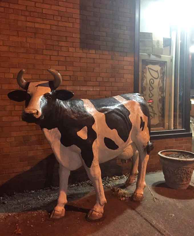 Even the exterior decor has personality, because why shouldn't a cow greet you at a place this committed to quality?