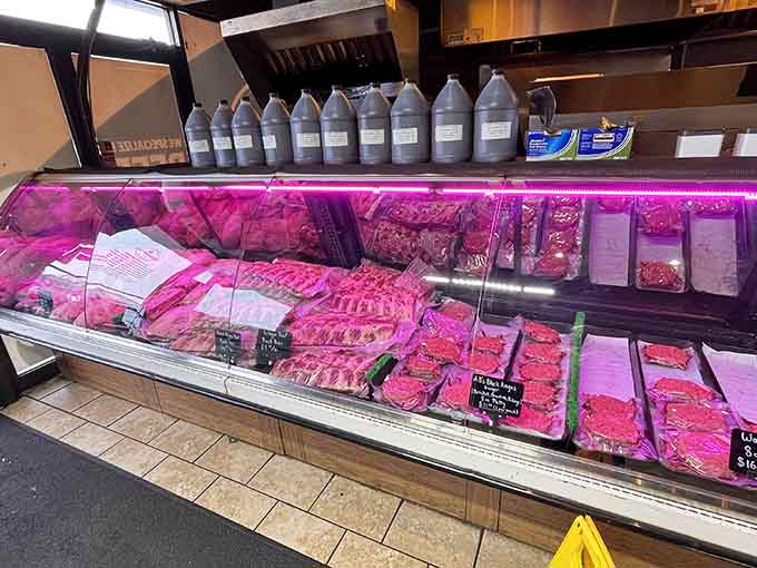 A refrigerated case showcases various cuts of meat waiting their turn for the low-and-slow smoking treatment.