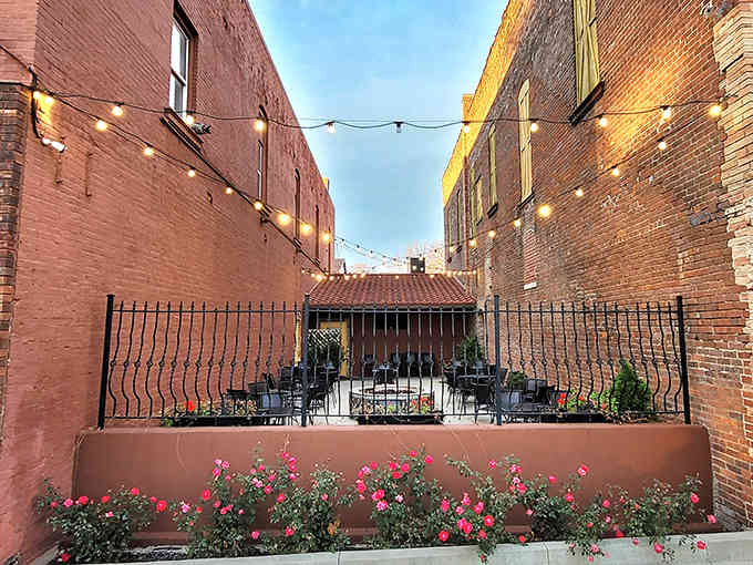 The outdoor patio with string lights transforms a simple meal into an evening event worth driving across the state.