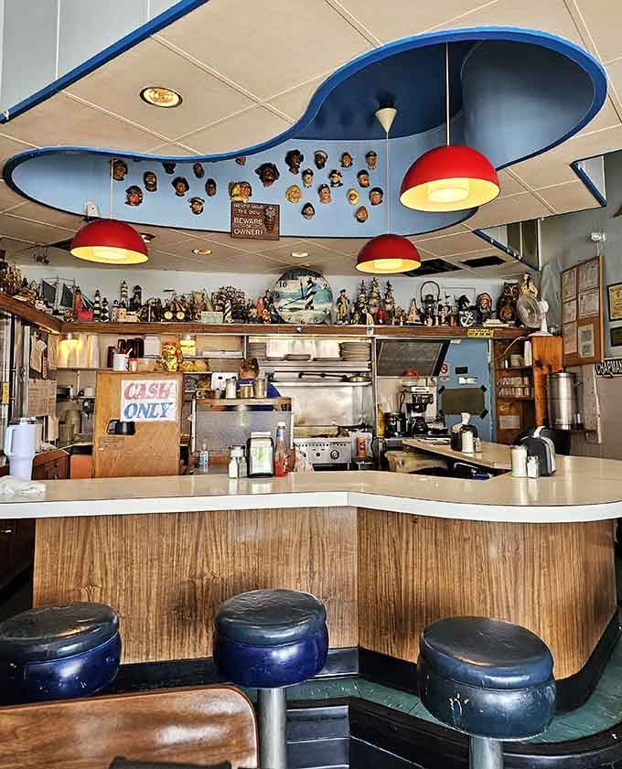 The counter beckons with retro stools and pendant lights, inviting solo diners to settle in comfortably.