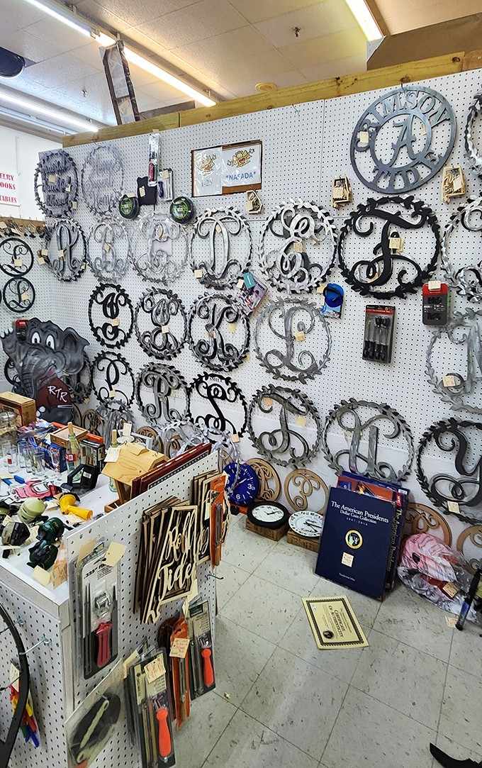 Metal monogram letters cover the pegboard wall like an alphabet explosion, personalizing homes one initial at a time.