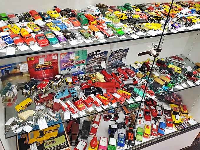 Die-cast cars arranged in perfect rows, ready to race straight back into someone's childhood memories today.