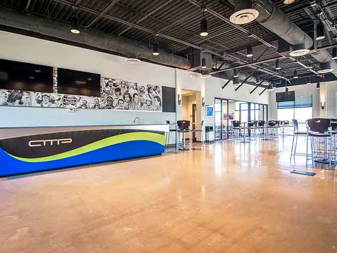 The modern clubhouse interior offers comfort and style, where racers can relax and relive their greatest moments between sessions.