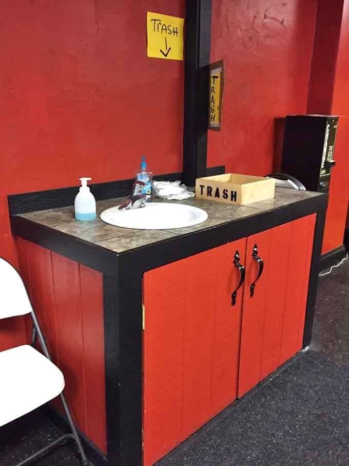 Even the hand-washing station keeps it real with straightforward signage, because authenticity matters in every detail.