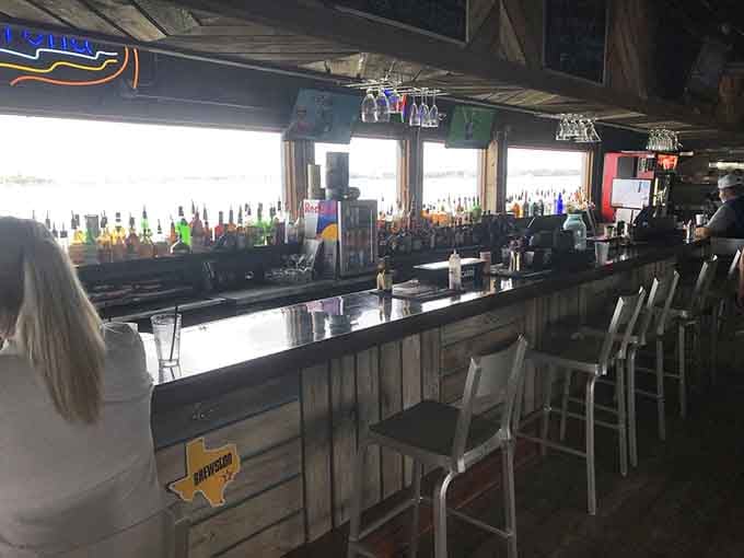 A well-stocked bar on a barge is proof that humans will find ways to drink anywhere, bless us.