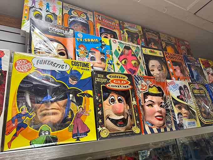 Vintage costume boxes showcase when Halloween meant cardboard, plastic masks, and absolutely zero fire safety standards.