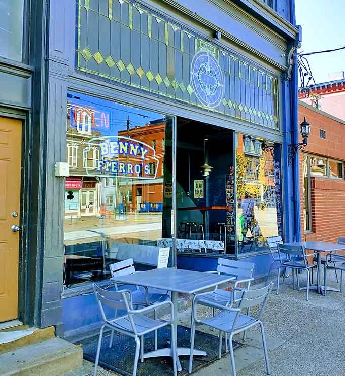 Outdoor seating where you can contemplate your massive slice while the neighborhood watches in supportive amusement and awe.