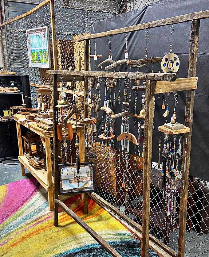 Handmade wind chimes and jewelry displays demonstrate the creative spirit thriving among the market's artisan vendors.