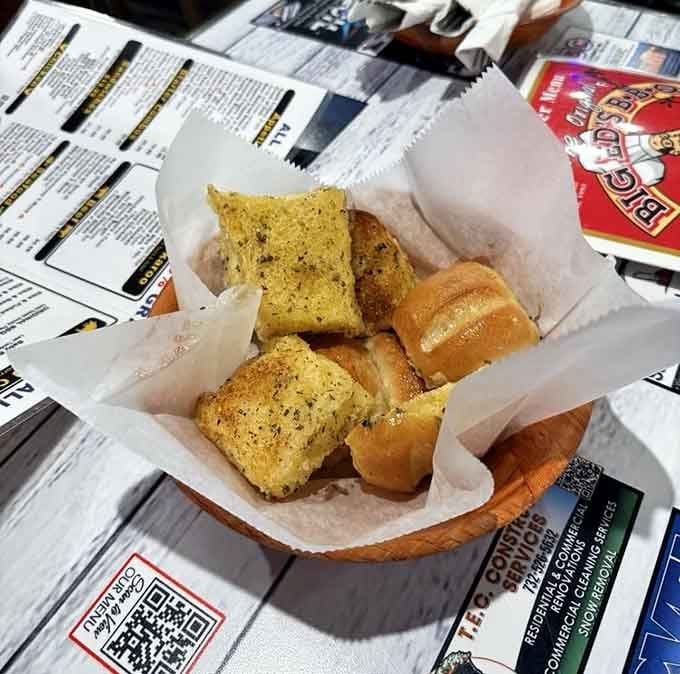 Warm garlic bread arrives as the perfect starter, buttery and seasoned, preparing your palate for the feast ahead.