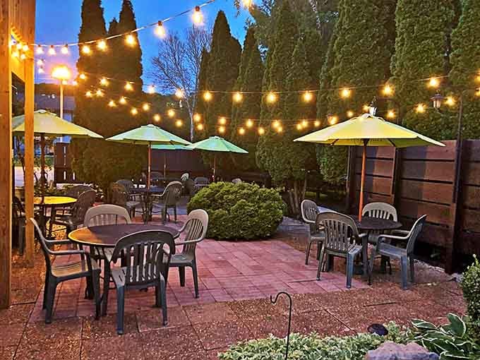 String lights and umbrellas transform this patio into the perfect spot for warm weather steak indulgence.