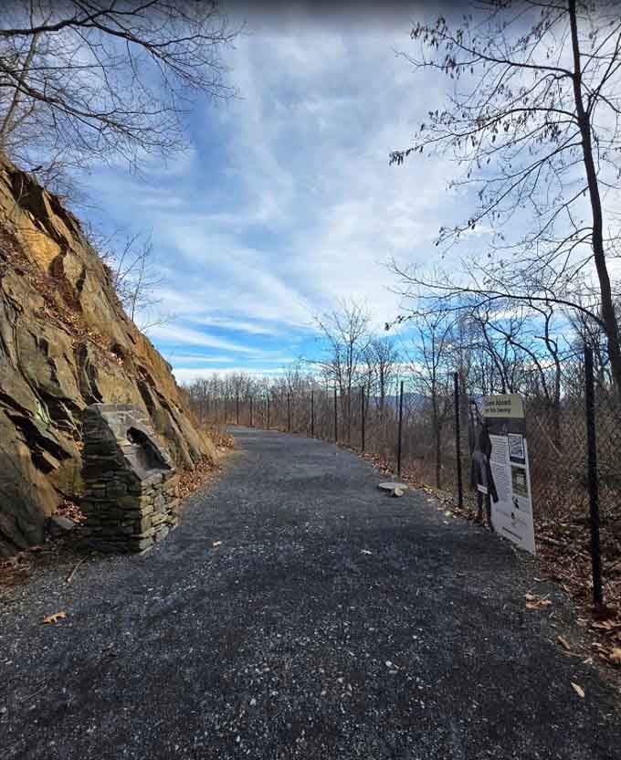 The approach path winds gently through rock cuts, building anticipation before you disappear into the mountain's cool embrace.