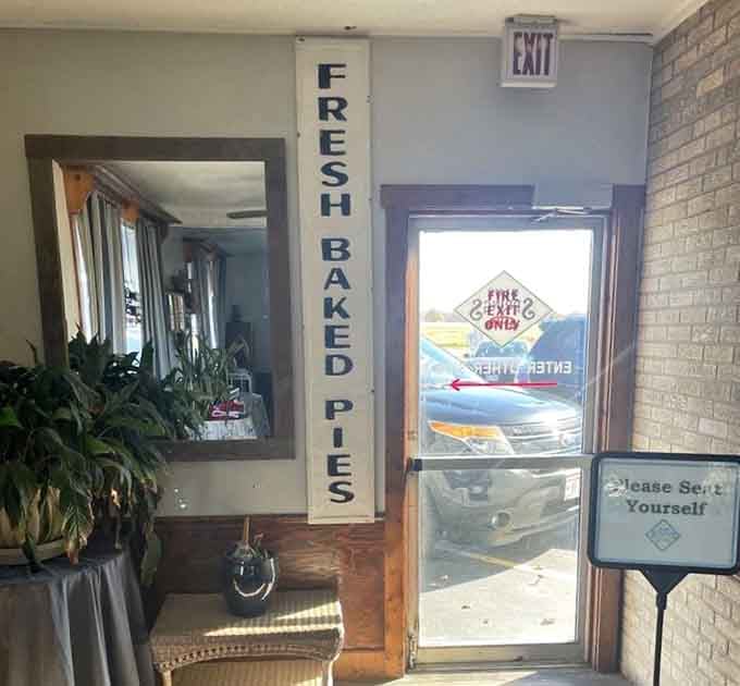 The "Fresh Baked Pies" sign by the exit is strategically placed to ensure nobody leaves without dessert plans.