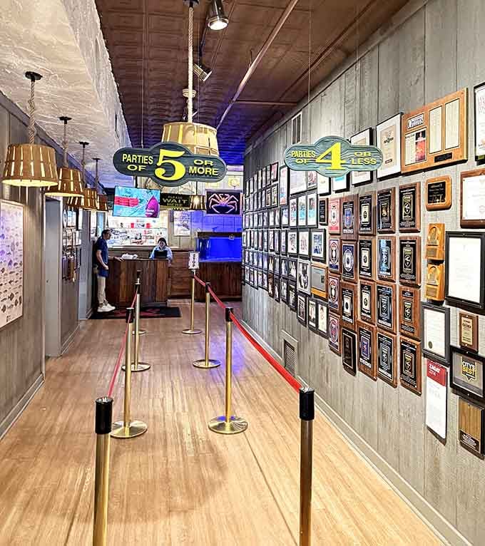 Award plaques lining the hallway tell the story of decades spent perfecting the art of exceptional seafood service.
