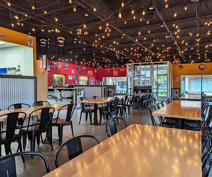 The dining room stretches out with plenty of space for families, friends, and serious barbecue enthusiasts alike.