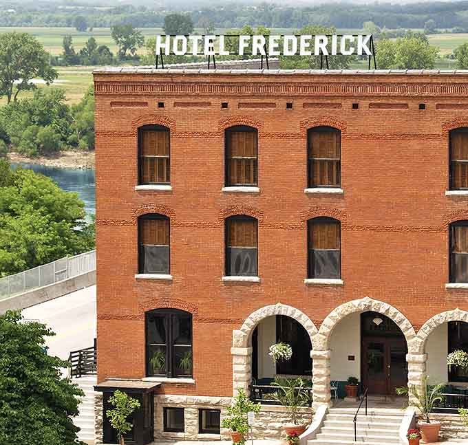 Hotel Frederick's rooftop sign and riverside location have been welcoming weary travelers since Missouri's steamboat era flourished.