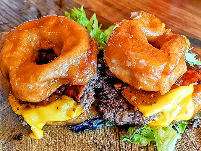Glazed donuts as burger buns represent either culinary genius or beautiful madness, and honestly, who cares which when it tastes this good.