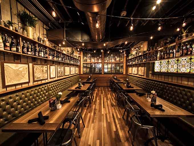 Cozy booth seating and warm wood tones create the perfect atmosphere for lingering over that third cup of coffee.