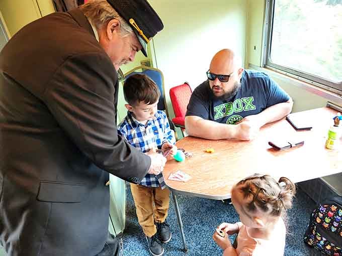 The conductor checks tickets while families settle in, beginning their journey through South Jersey's scenic countryside.