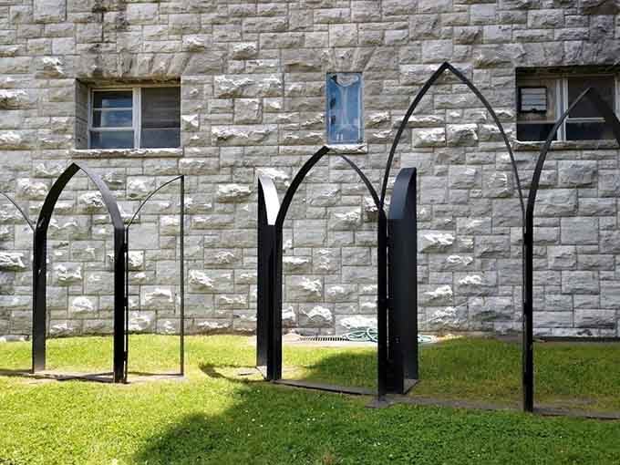 These metal arches are modern art meets medieval vibes, proving castles can appreciate contemporary design too.