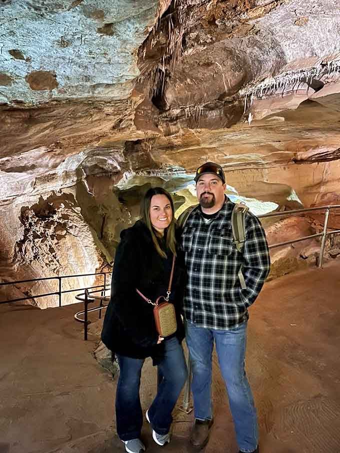 Nothing says romance like posing in a cave that's been hosting couples since before your grandparents were born.