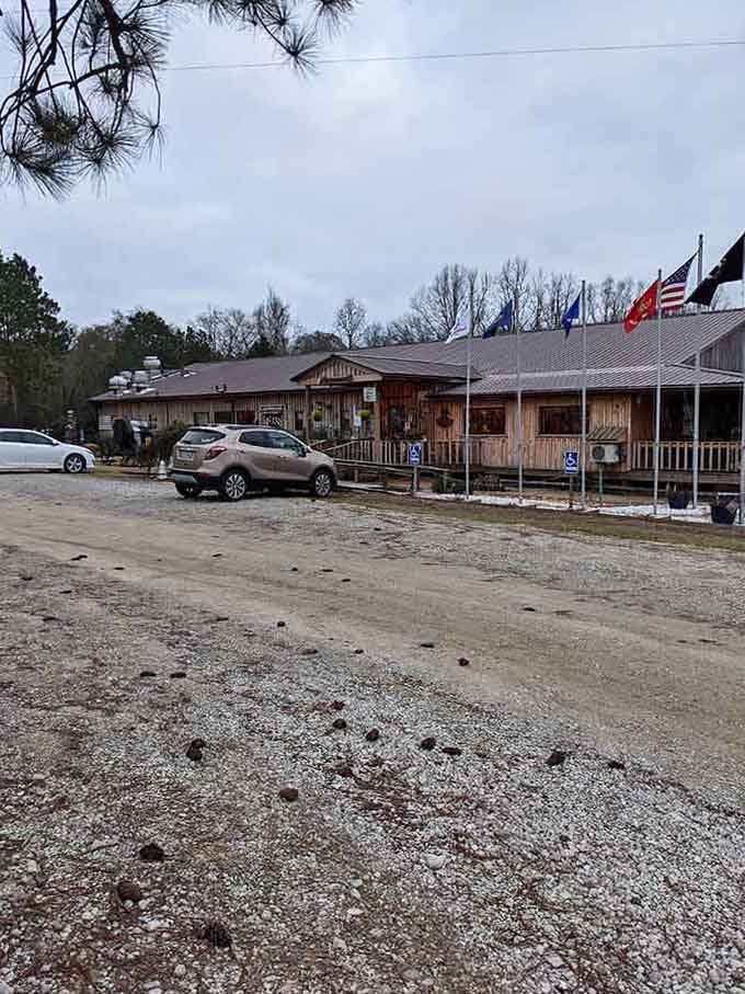 Gravel parking and American flags signal you've arrived at something genuinely special and unpretentious.