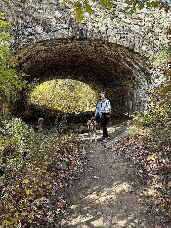 The trail welcomes all visitors, including four-legged friends who appreciate a good waterfall as much as their humans do.