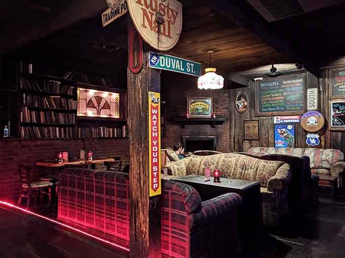 Plaid couches and street signs create cozy booth seating that makes leaving after dinner genuinely difficult.